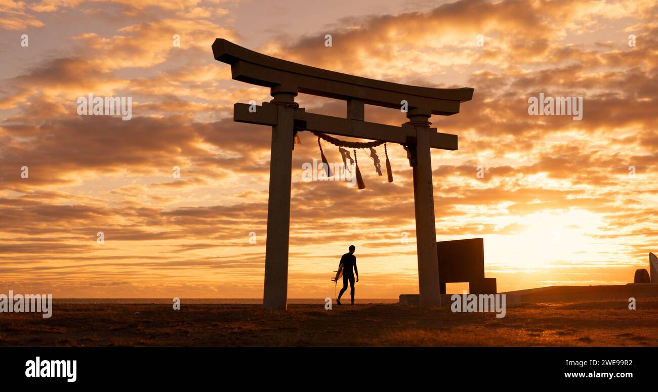 Torii gate, sunset sky and man at ocean with surfboard, spiritual history and travel adventure ...