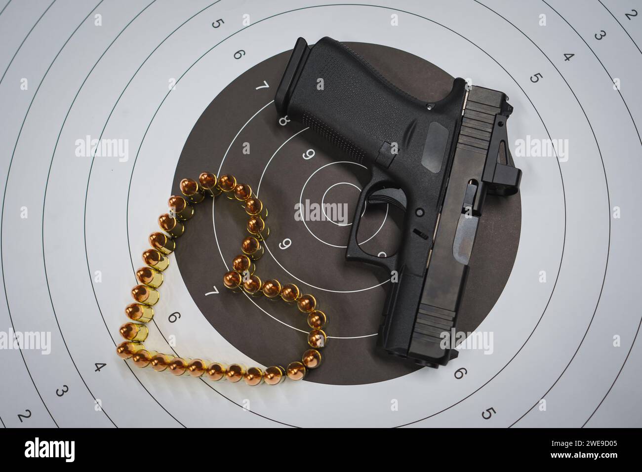 Theme of Valentine's day and weapons. Compact pistol g43x with a red ...