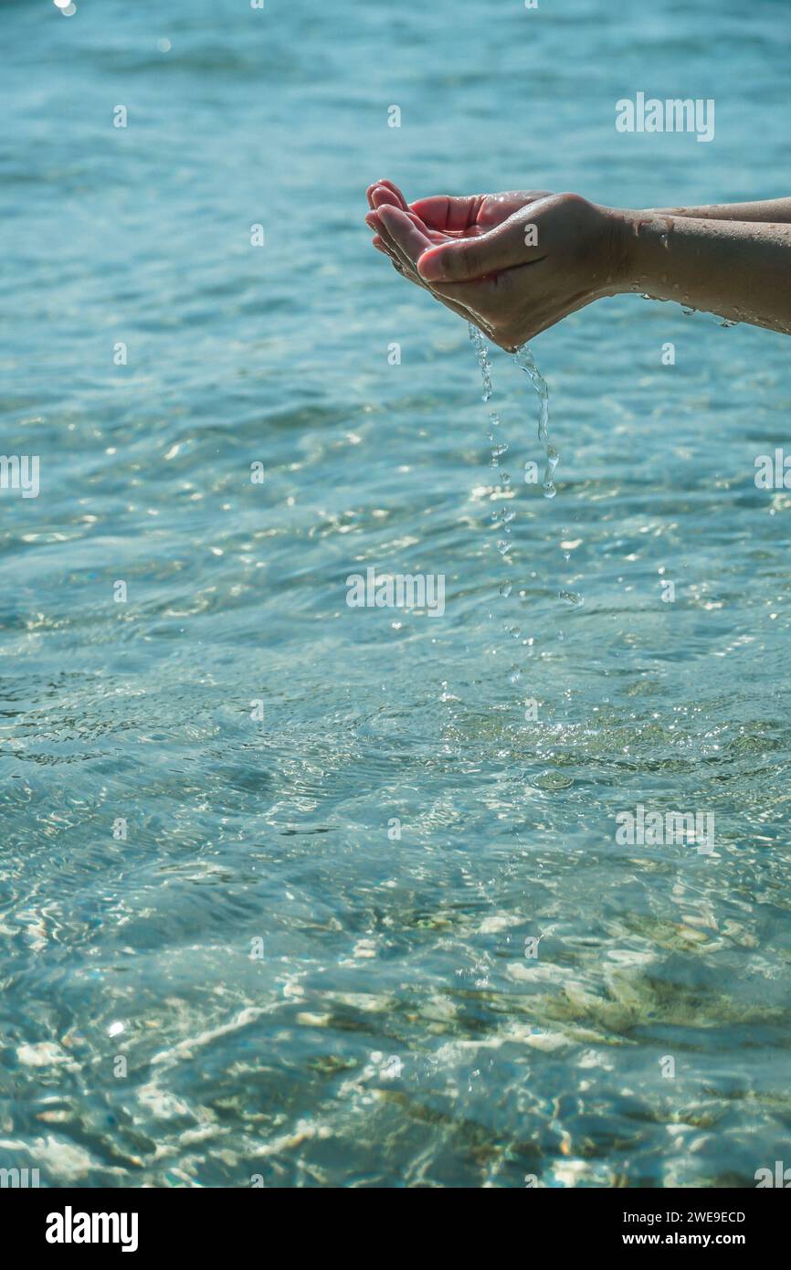 Hand reaching underwater hi-res stock photography and images - Alamy