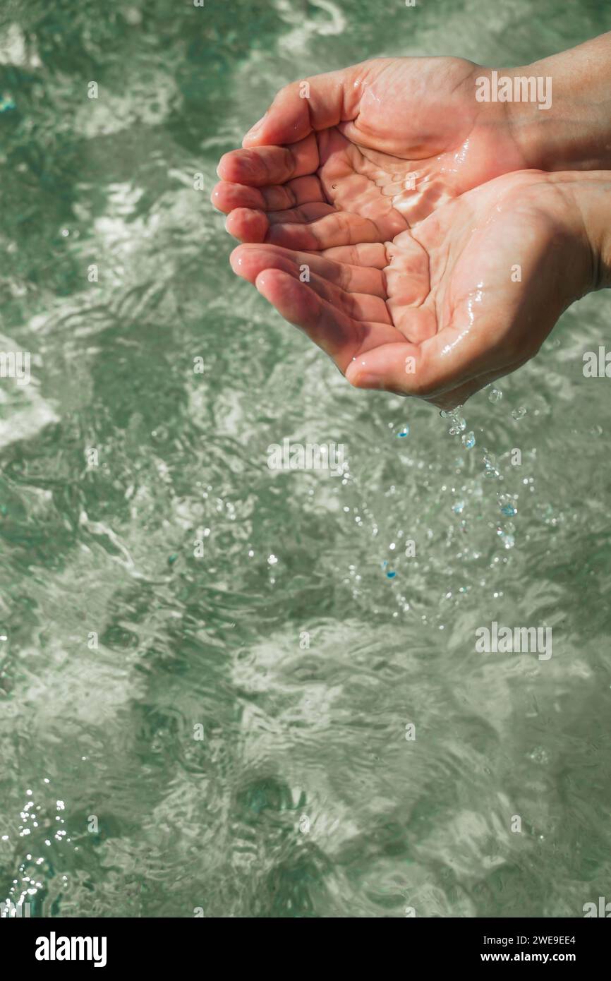 Hand Reaching Out Of Water