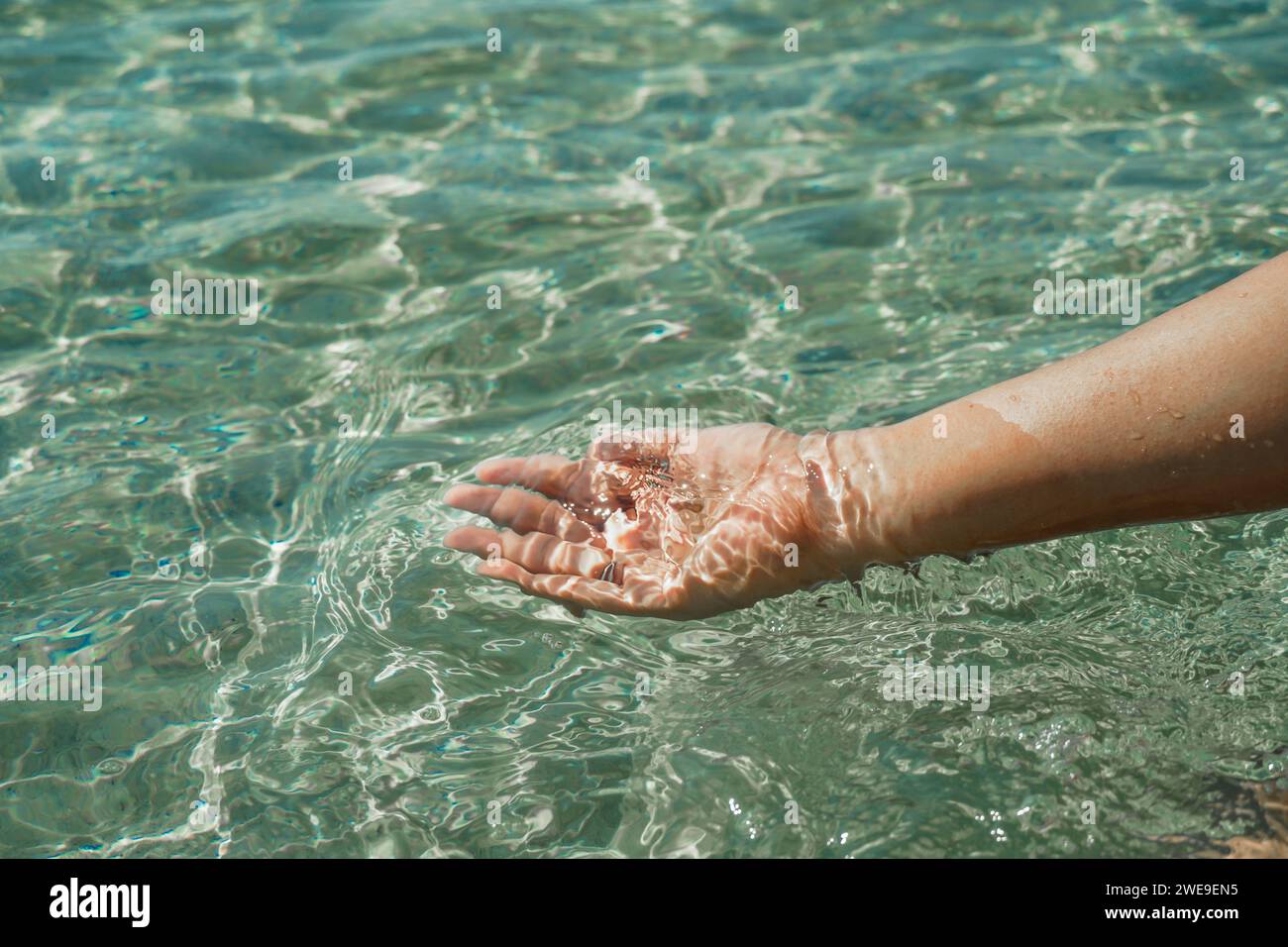 Hand reaching out touching hi-res stock photography and images - Alamy