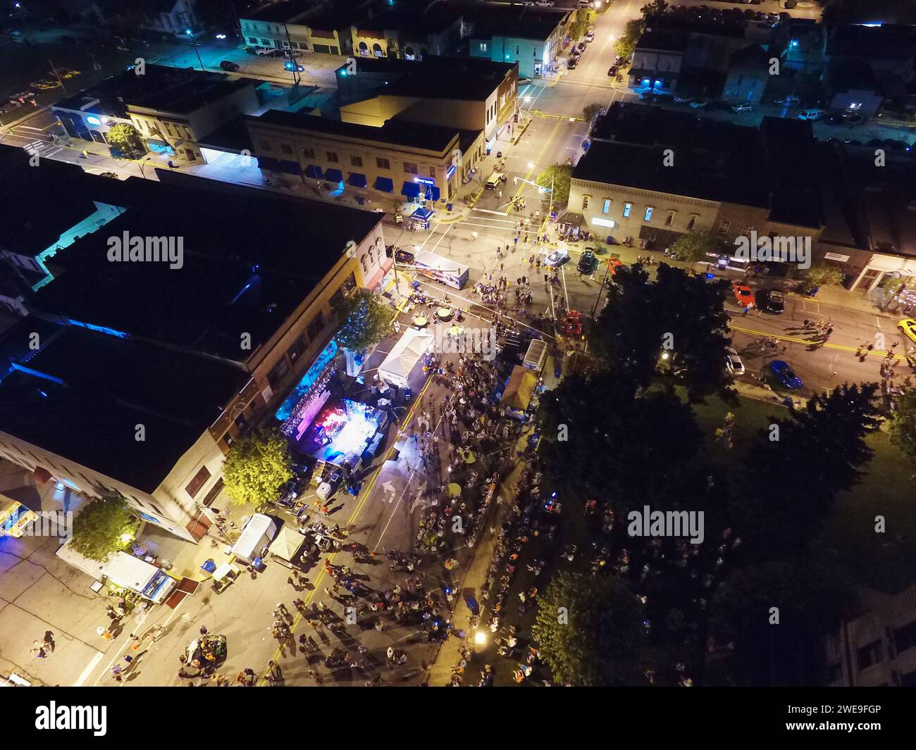 Aerial Nighttime Urban Event with Stage Lighting and Crowd in Indiana ...
