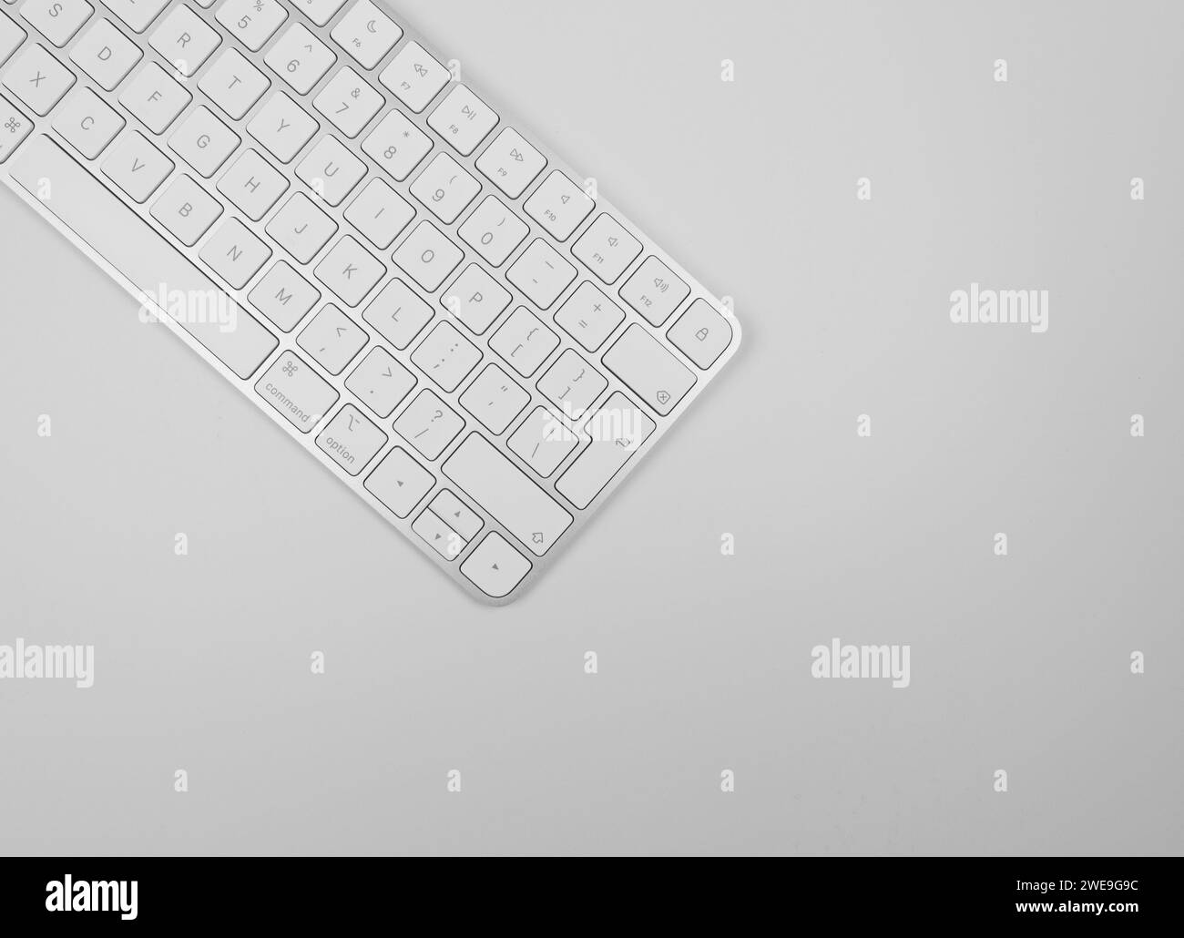 Top view of white keyboard on light grey background. Modern office flat ...