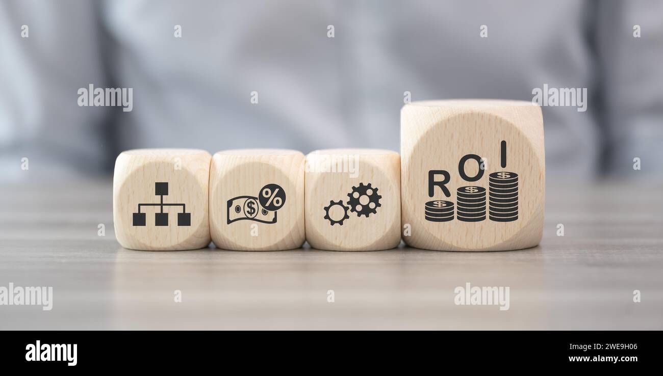 Wooden blocks with symbol of roi concept Stock Photo - Alamy