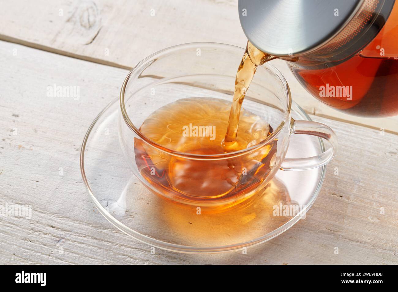 Image of drinking hot tea at tea time Stock Photo - Alamy