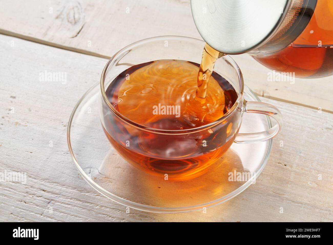 Image of drinking hot tea at tea time Stock Photo - Alamy
