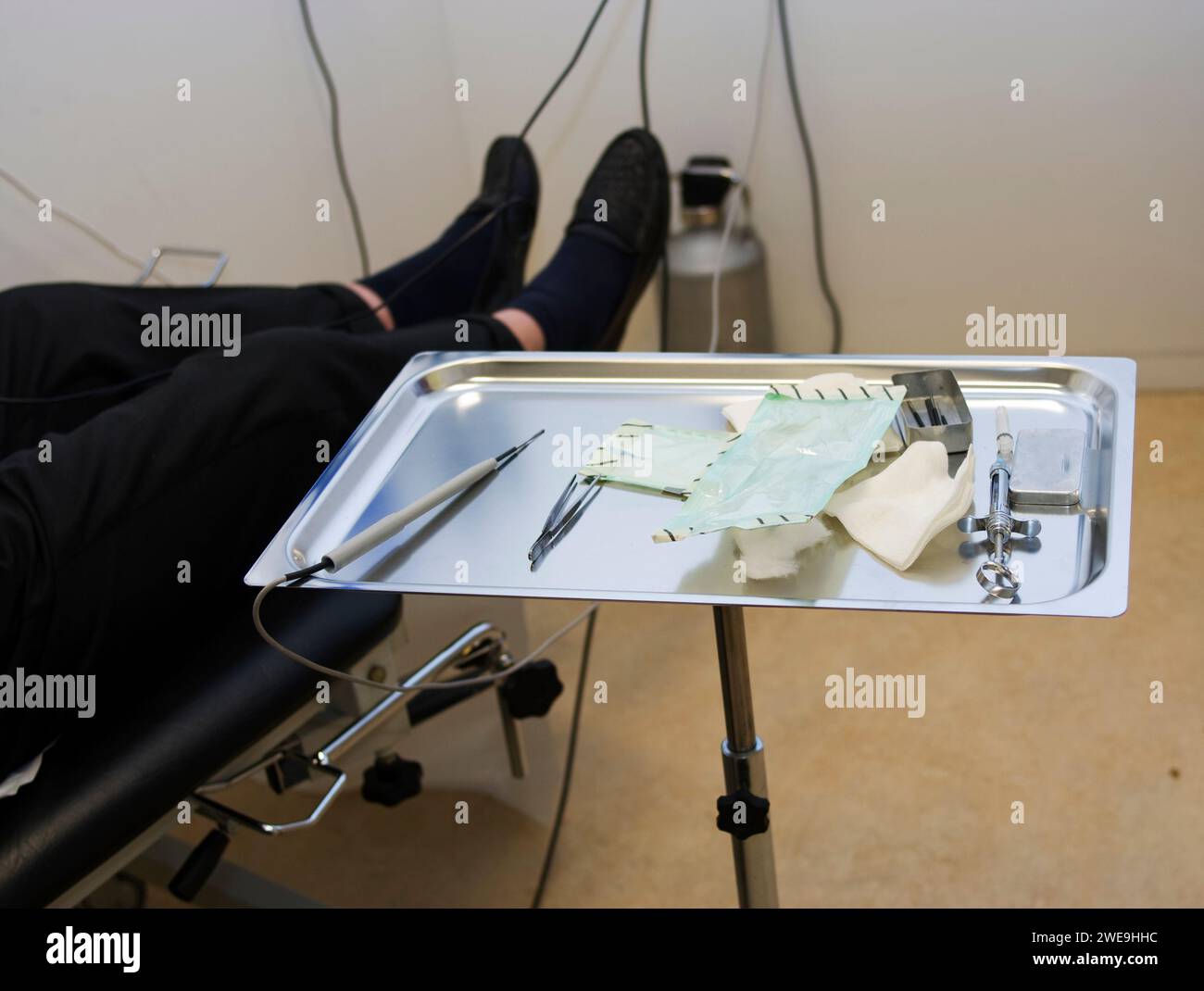 Tray with medical equipment and patient Stock Photo - Alamy