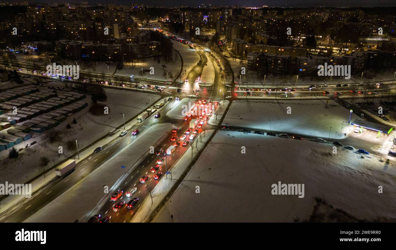 Drone photography of high intensity road in a city during cloudy winter ...