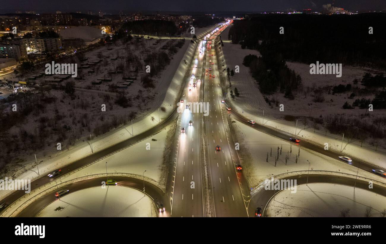 Drone photography of high intensity road in a city during cloudy winter ...