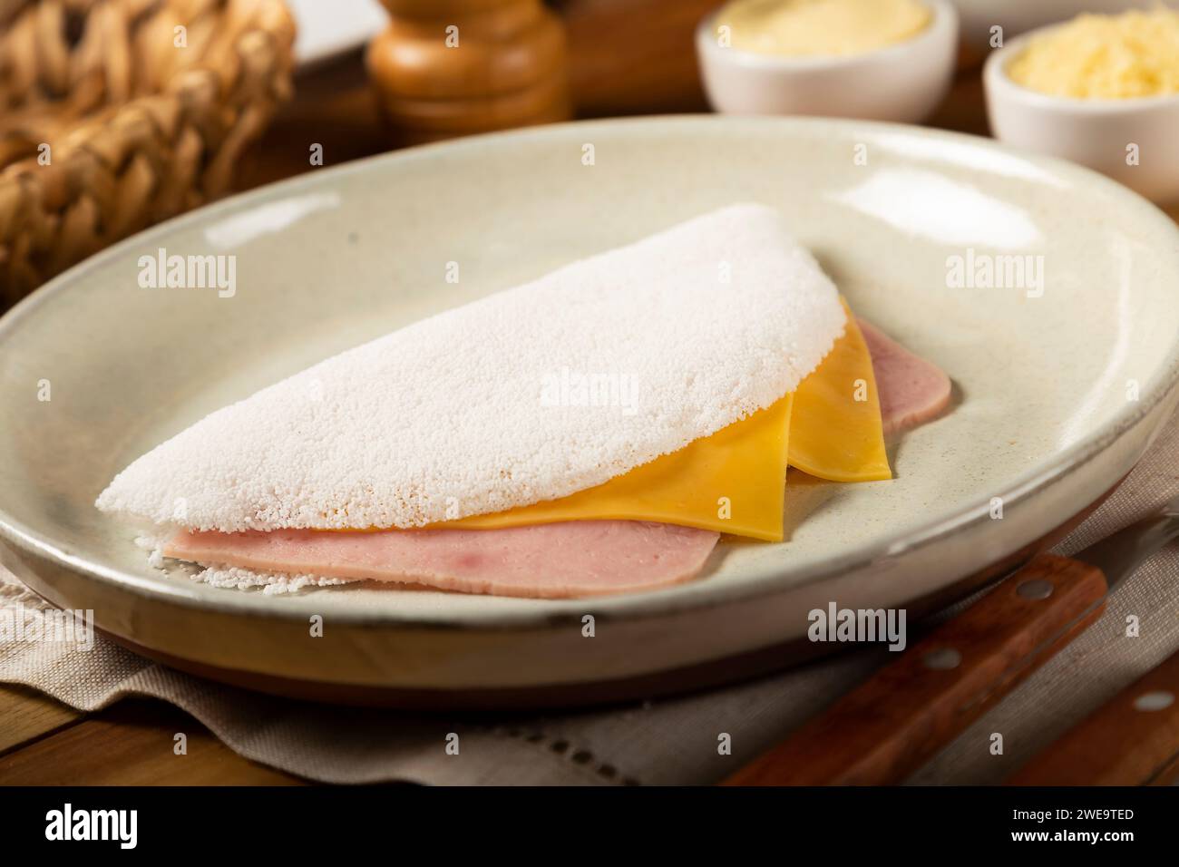 Tapioca stuffed with cheese and ham. Brazilian tapioca Stock Photo - Alamy