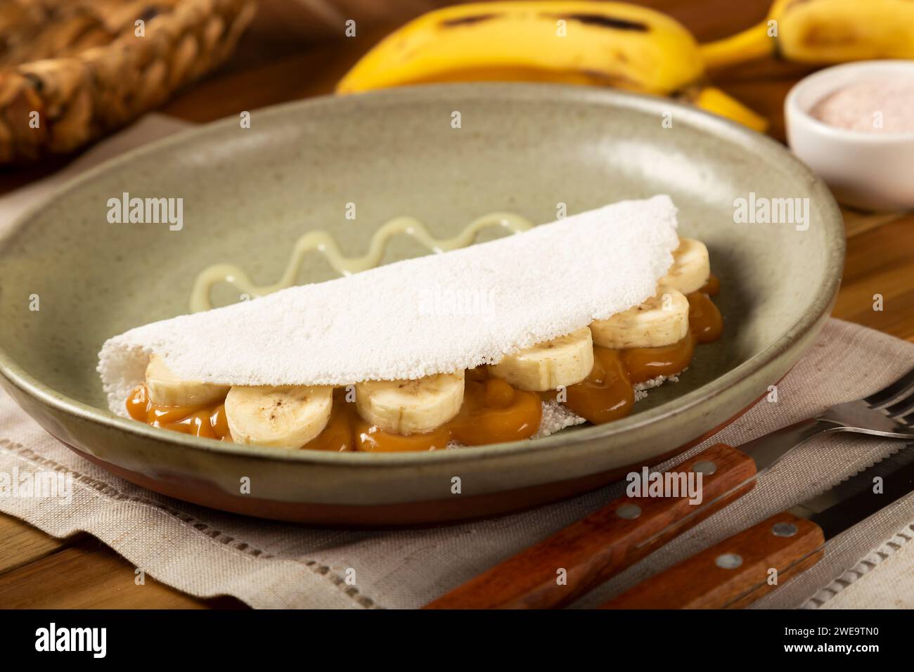 Sweet tapioca stuffed with dulce de leche and banana. Brazilian tapioca ...