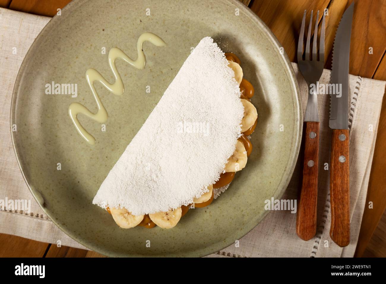 Sweet tapioca stuffed with dulce de leche and banana. Brazilian tapioca ...