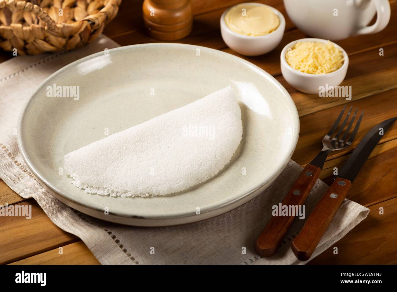 Tapioca with butter on the table. Brazilian tapioca Stock Photo - Alamy