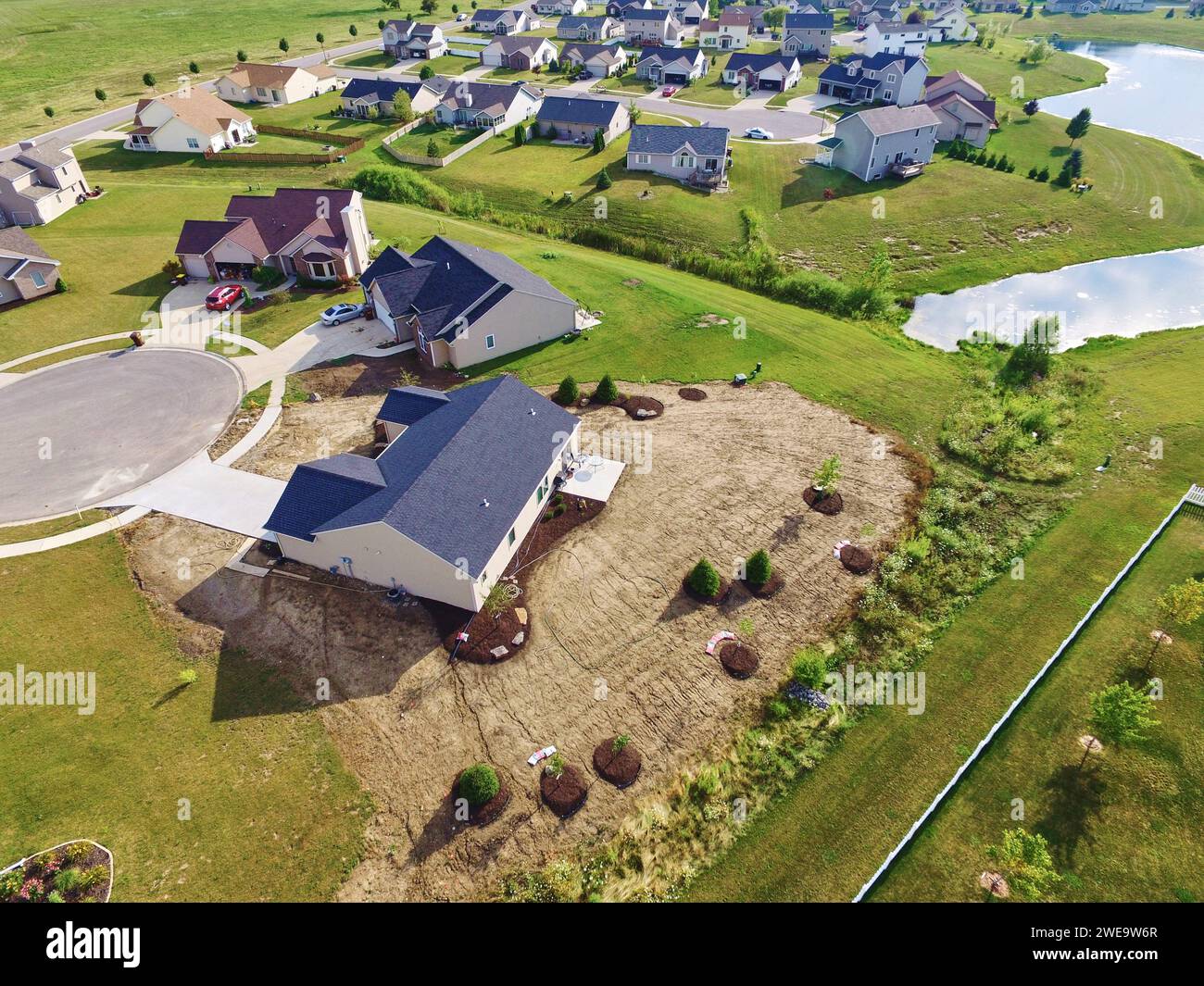 Aerial Suburban Landscape with Diverse Architecture and Unfinished ...