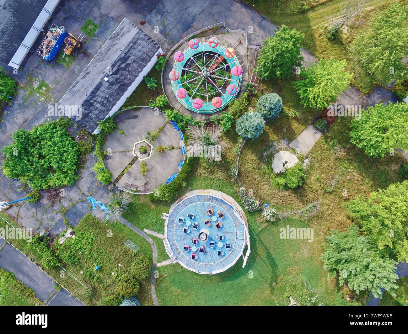 Aerial Deserted Amusement Park Rusting Ferris Wheel and Overgrown ...
