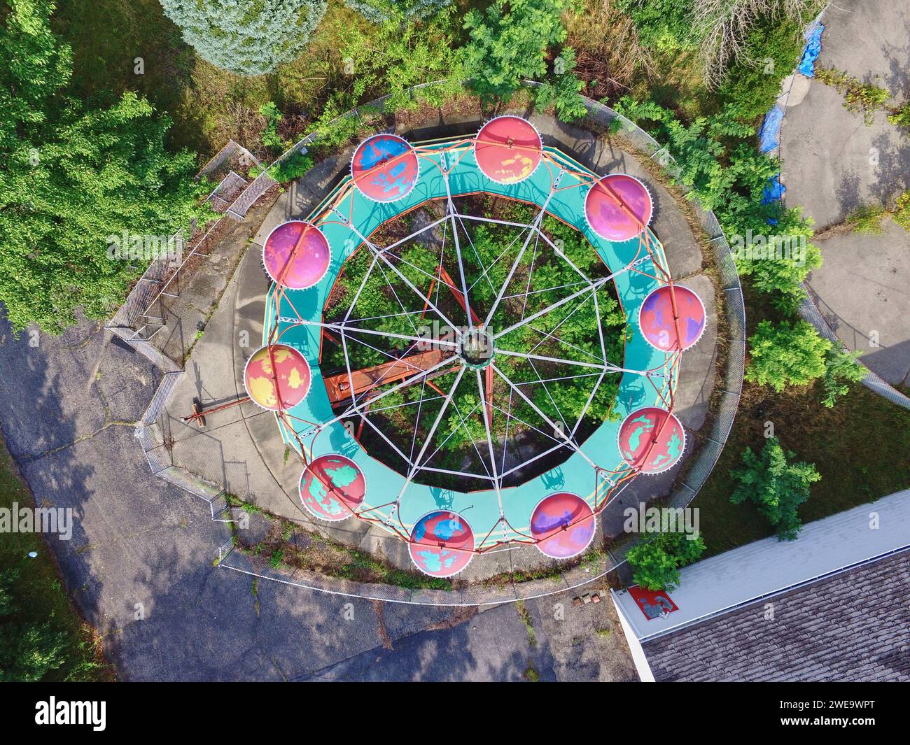 Aerial View of Abandoned Ferris Wheel Among Overgrowth in Indiana Stock ...