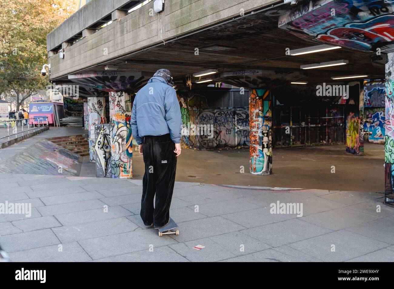 London, England - December 9, 2022: Teenagers skateboarding in a skate ...