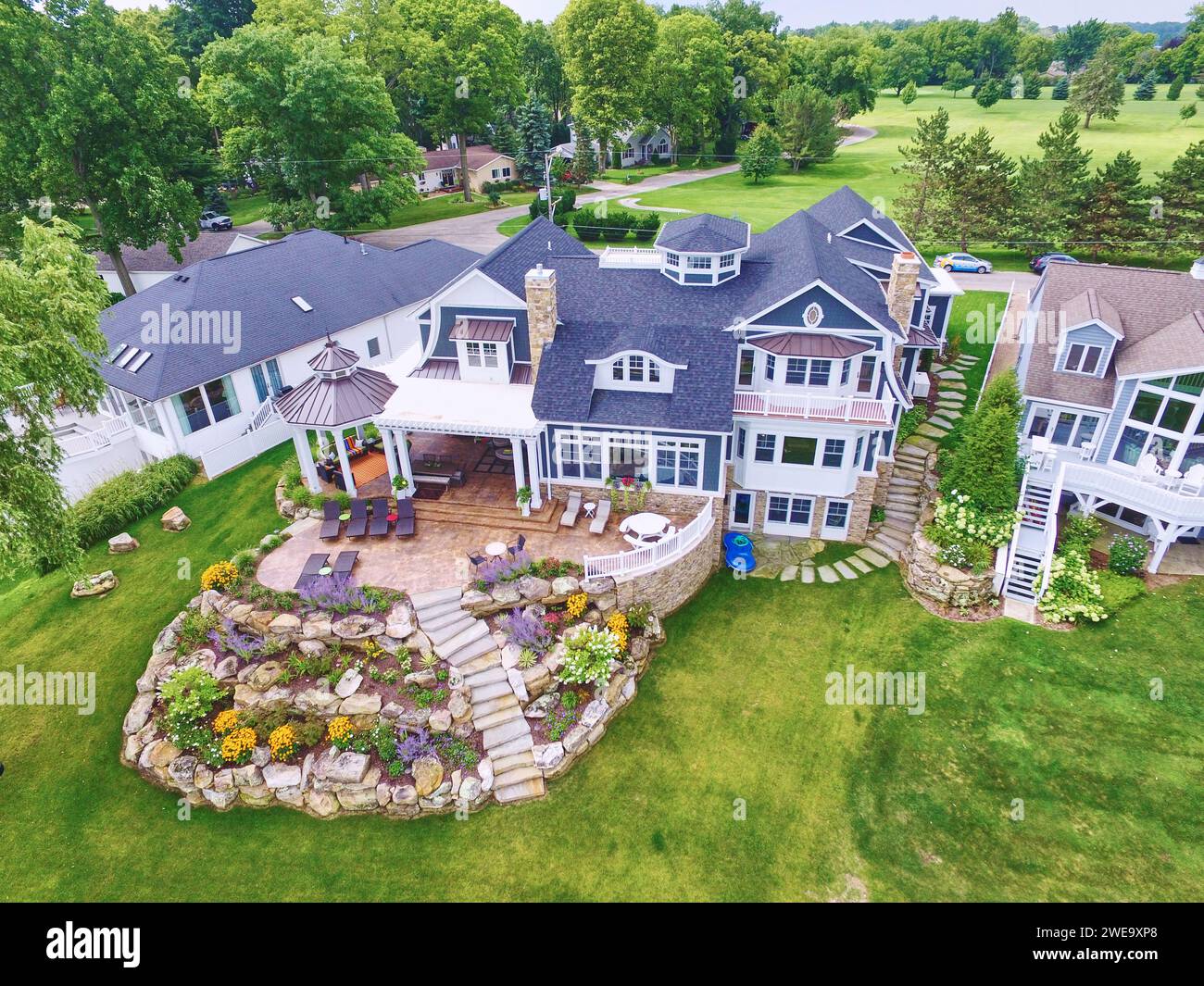 Aerial View of Luxurious Residential Estate with Lush Gardens and Patio ...