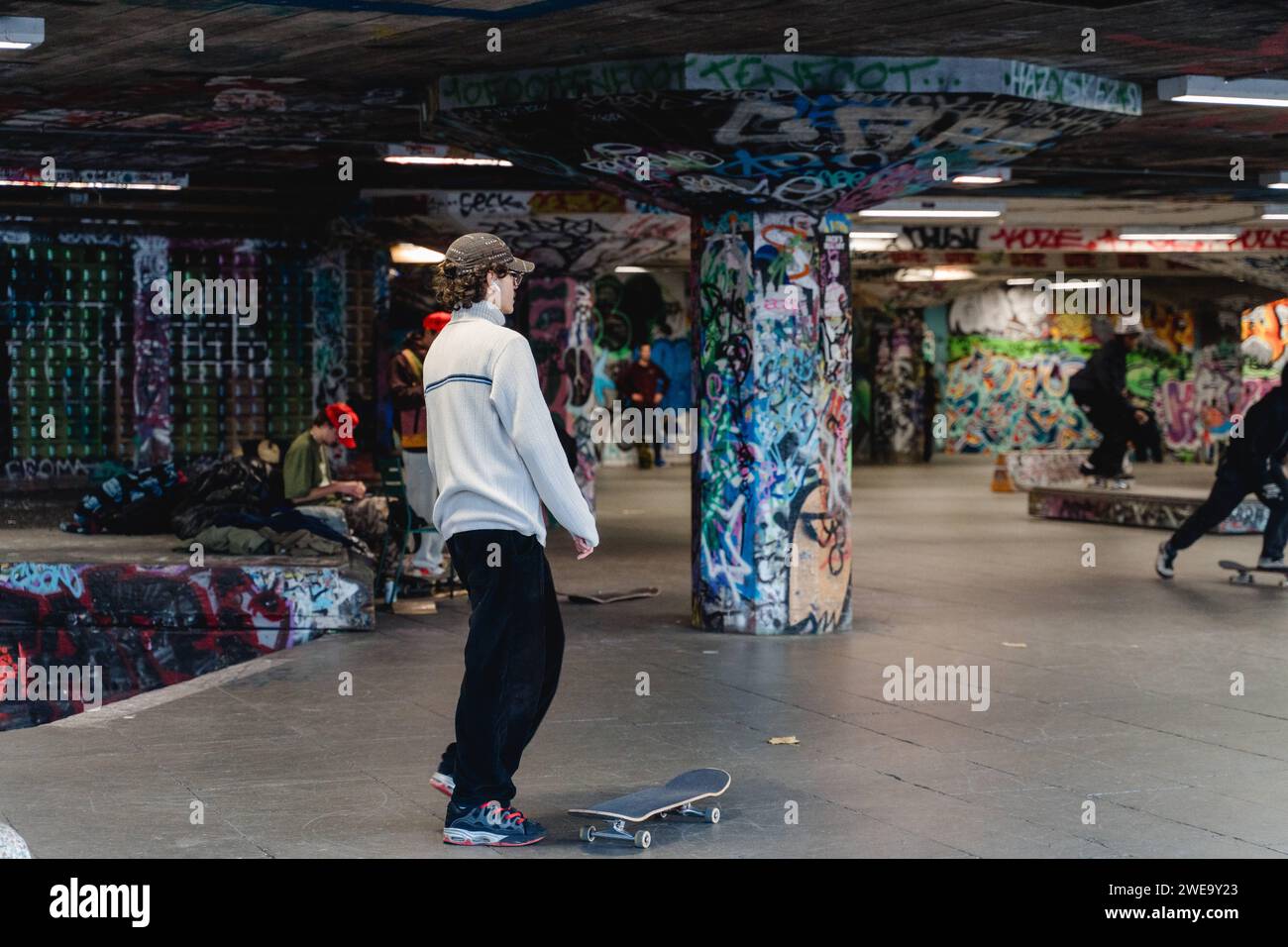 London, England - December 9, 2022: Teenagers skateboarding in a skate ...