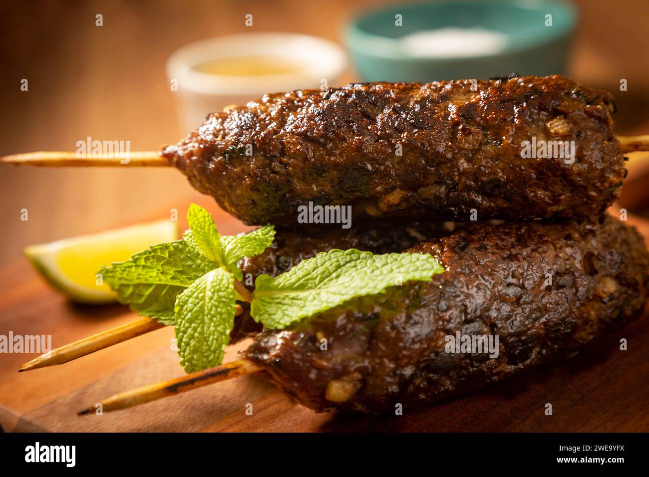 Beef kafta on the wooden board. Kafta, Traditional Arabic cuisine Stock ...