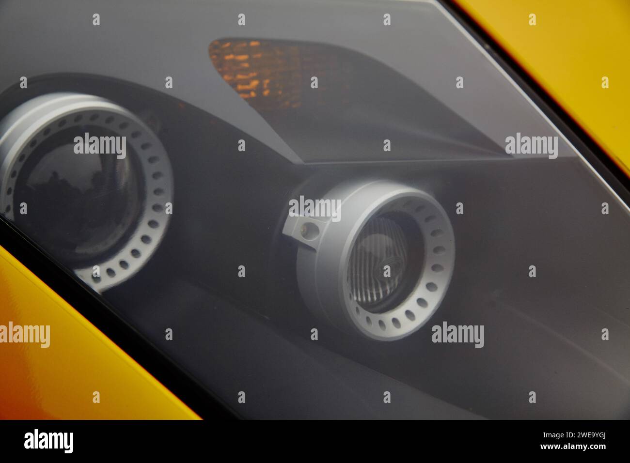 Modern Car Headlight Design Detail with Yellow Accents, Close-Up View ...