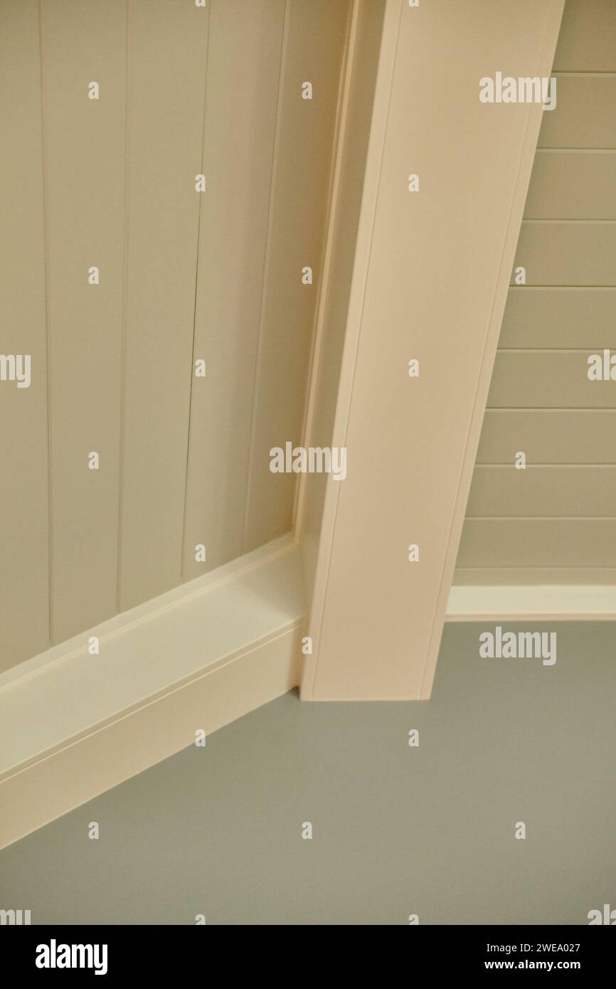 Minimalist Interior Corner with Textured Wall and Skirting Board Stock ...