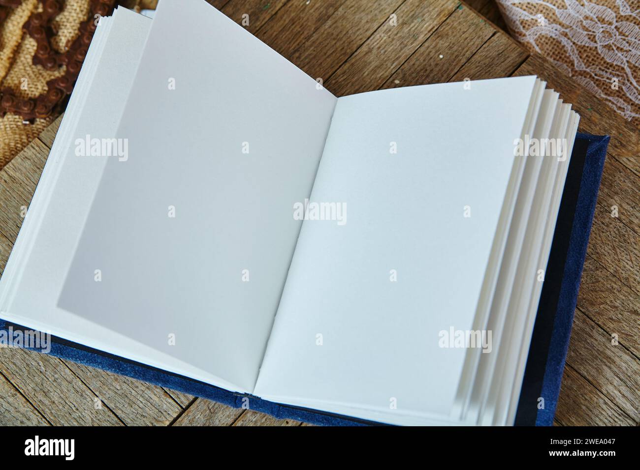 Blank Open Book on Wooden Surface with Vintage Background Stock Photo ...