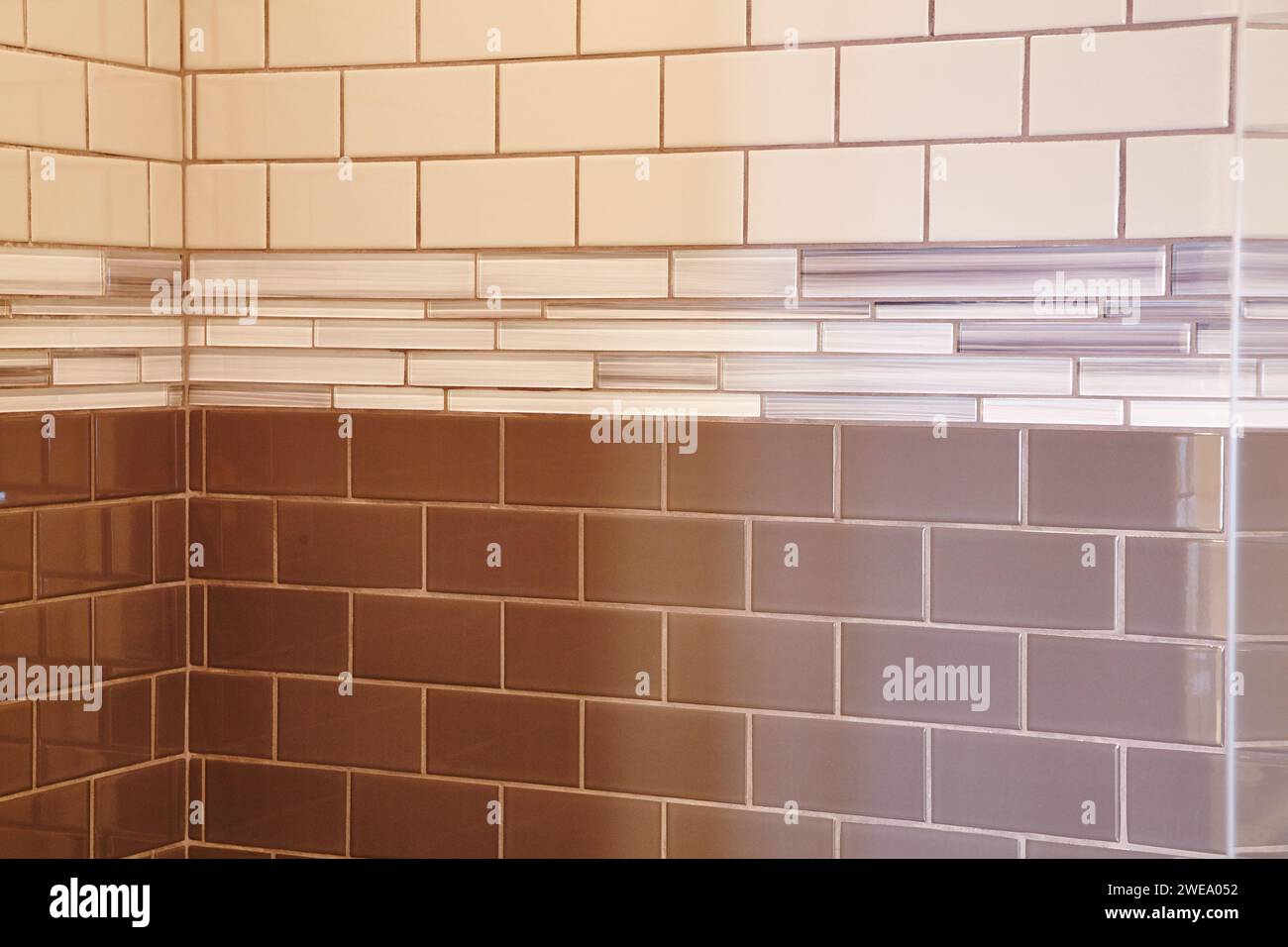 Modern Ceramic Tile Wall with Metallic Accent Band Stock Photo - Alamy