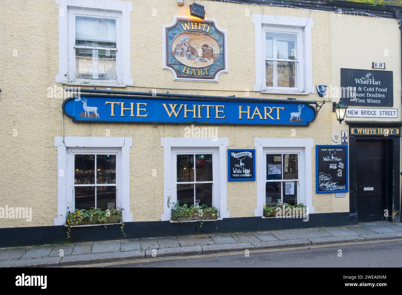 The facade of the historic 18th century White Hart pub public house in ...