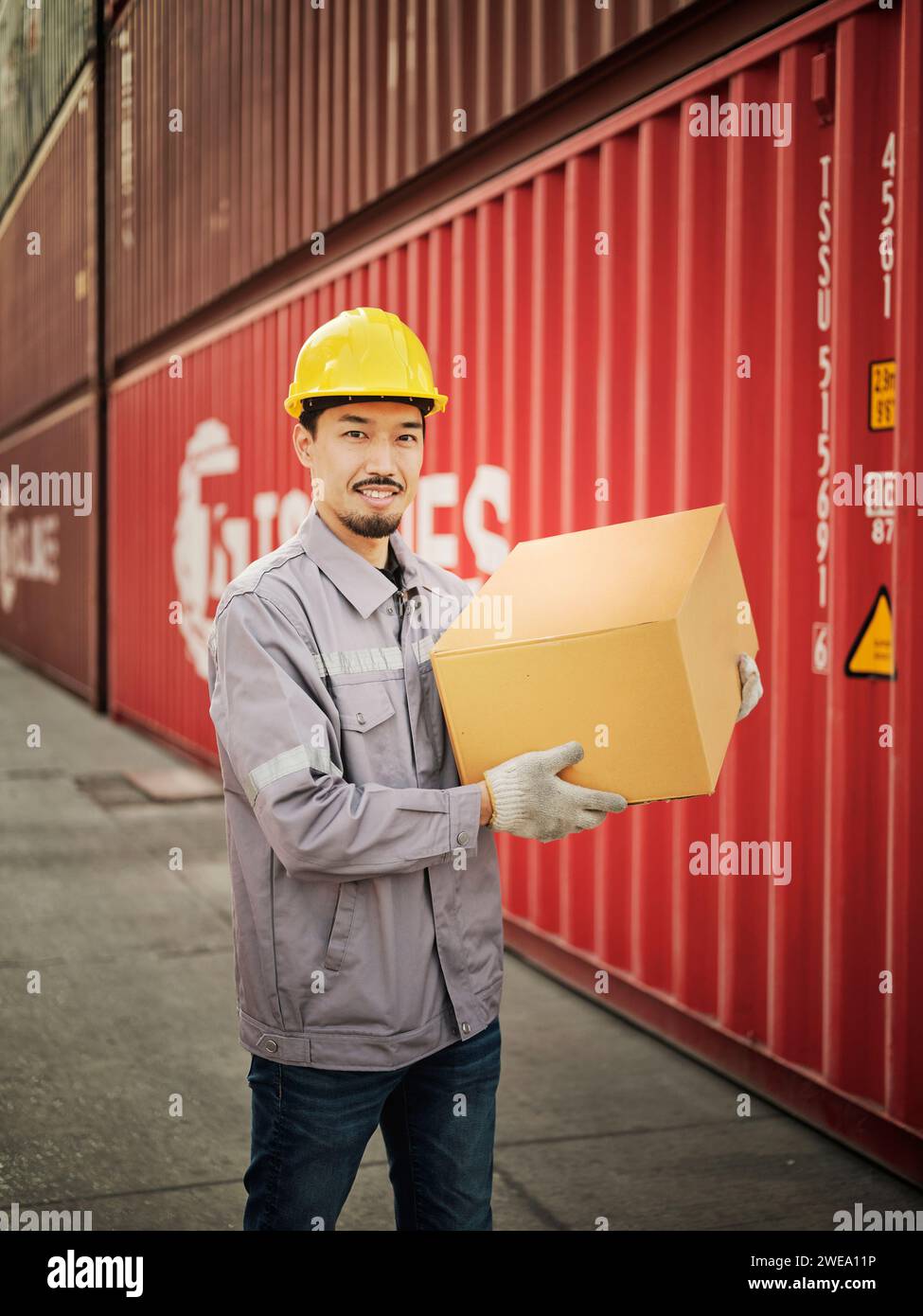 Team Engineer worker hold cardboard box packaging checking product ...