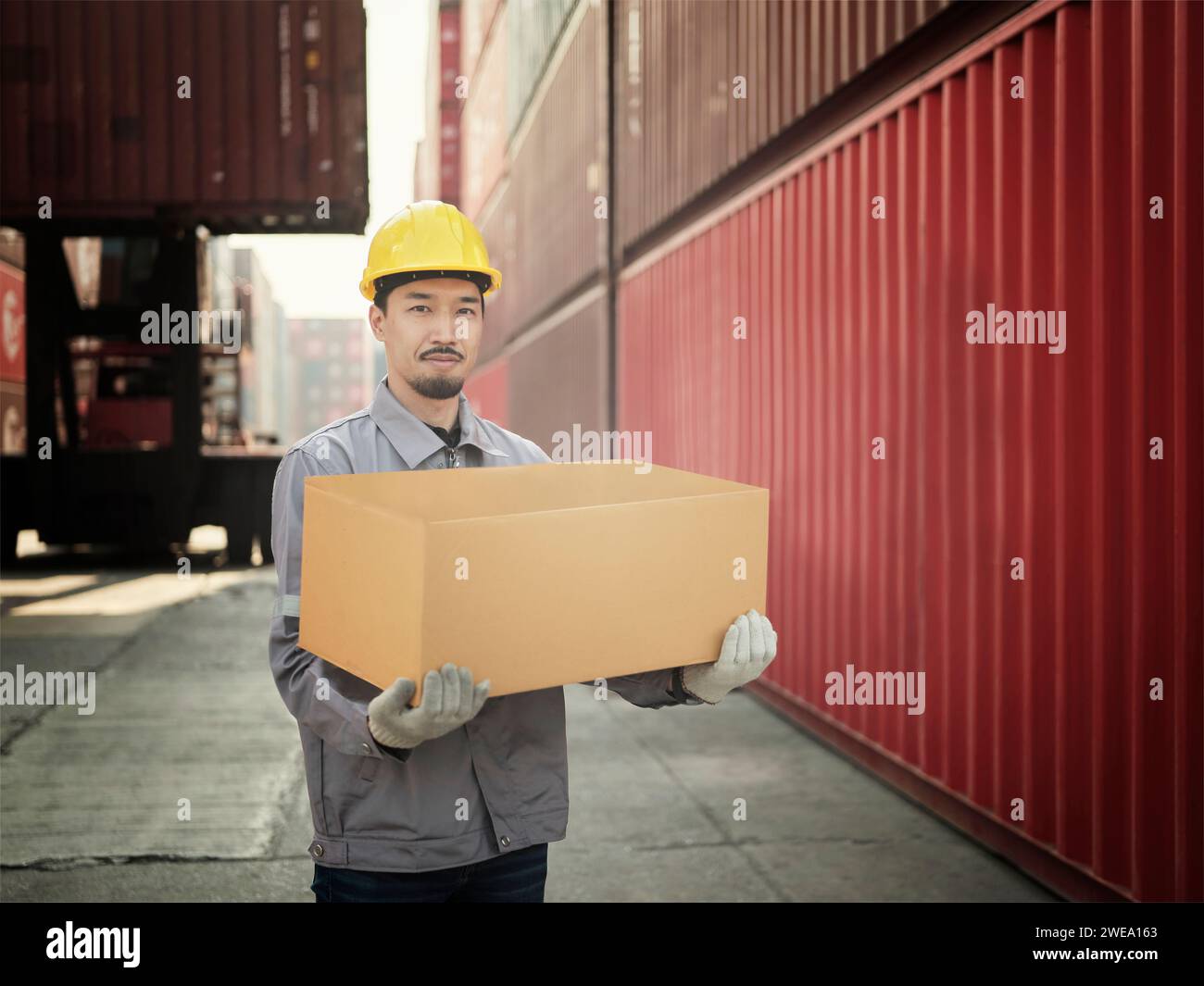Engineer worker hold cardboard box packaging on product quality. at ...