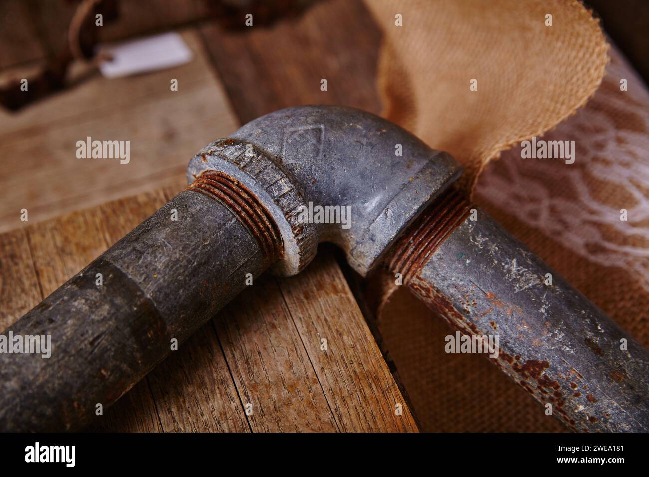 Vintage Pipe Corner on Wooden Surface with Rustic Backdrop Stock Photo ...
