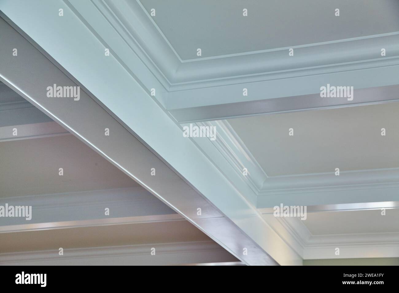 Elegant Tray Ceiling and Crown Molding in Serene Interior Stock Photo ...