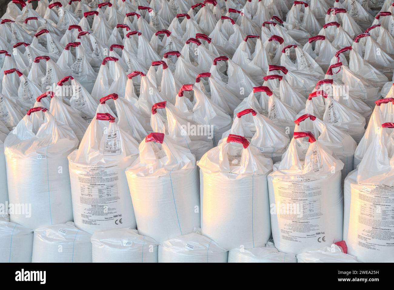 Stack of fertiliser bags in storage Stock Photo - Alamy