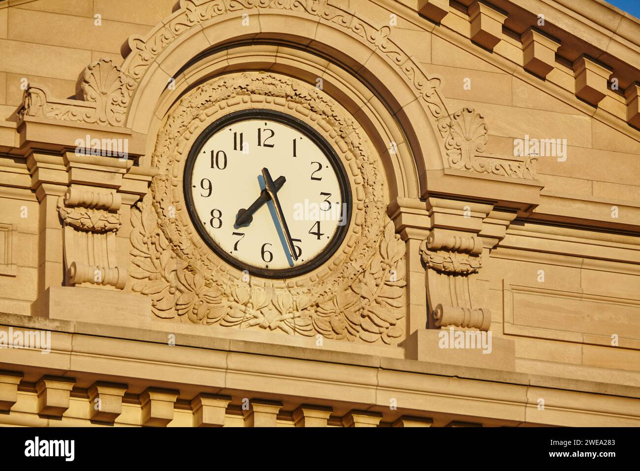 Golden Hour Clock on Historic Courthouse Facade, Low Angle View Stock ...