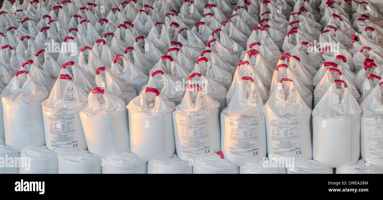 Stack of fertiliser bags in storage Stock Photo - Alamy