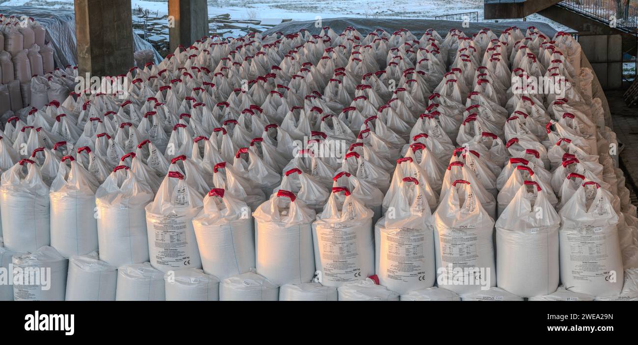Stack of fertiliser bags in storage Stock Photo - Alamy