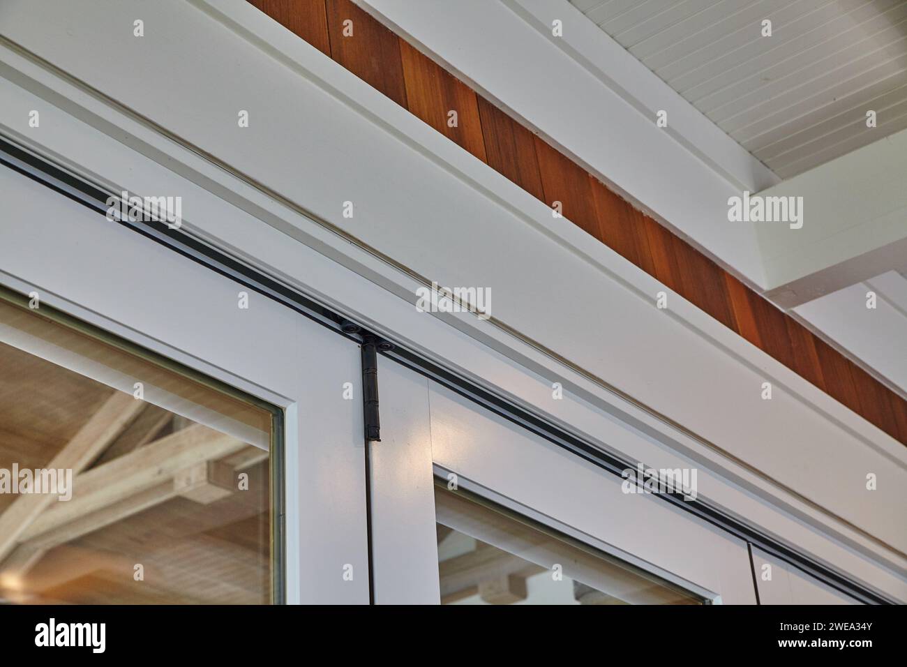 Modern Interior with Sliding Glass Door and Wood Ceiling Detail Stock ...