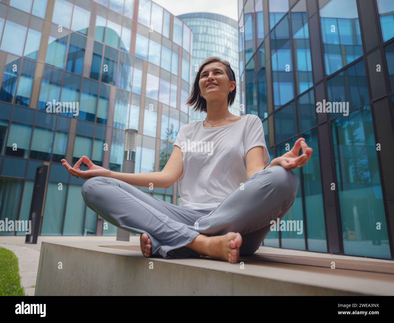 De-stress, unwind idea. peaceful female freelance employee practicing ...