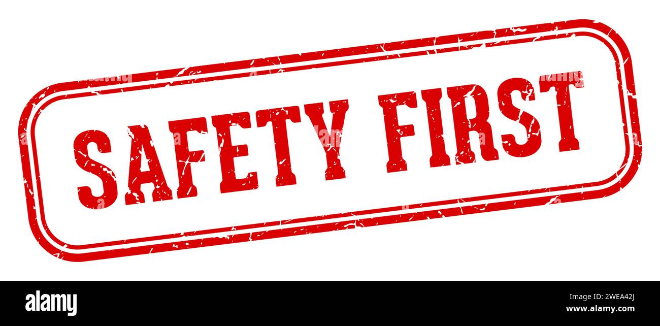safety first stamp. safety first rectangular stamp isolated on white ...