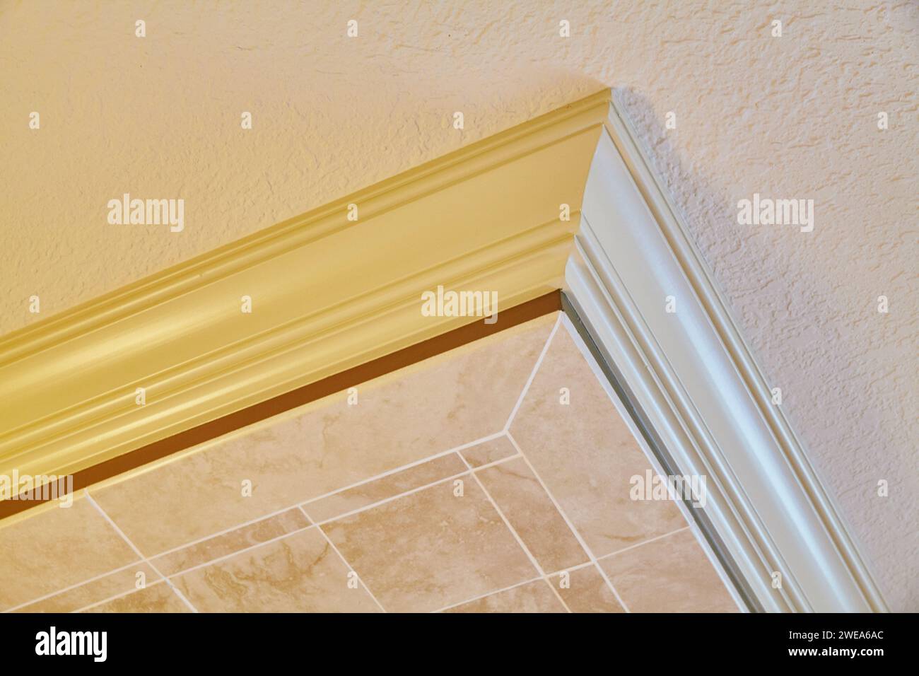 Elegant Interior Corner with Baseboard and Tiled Flooring Stock Photo ...