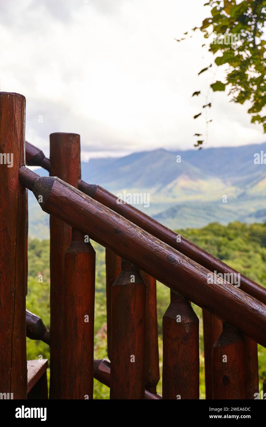 Wooden Railing Overlook and Forested Mountains Landscape Stock Photo - Alamy
