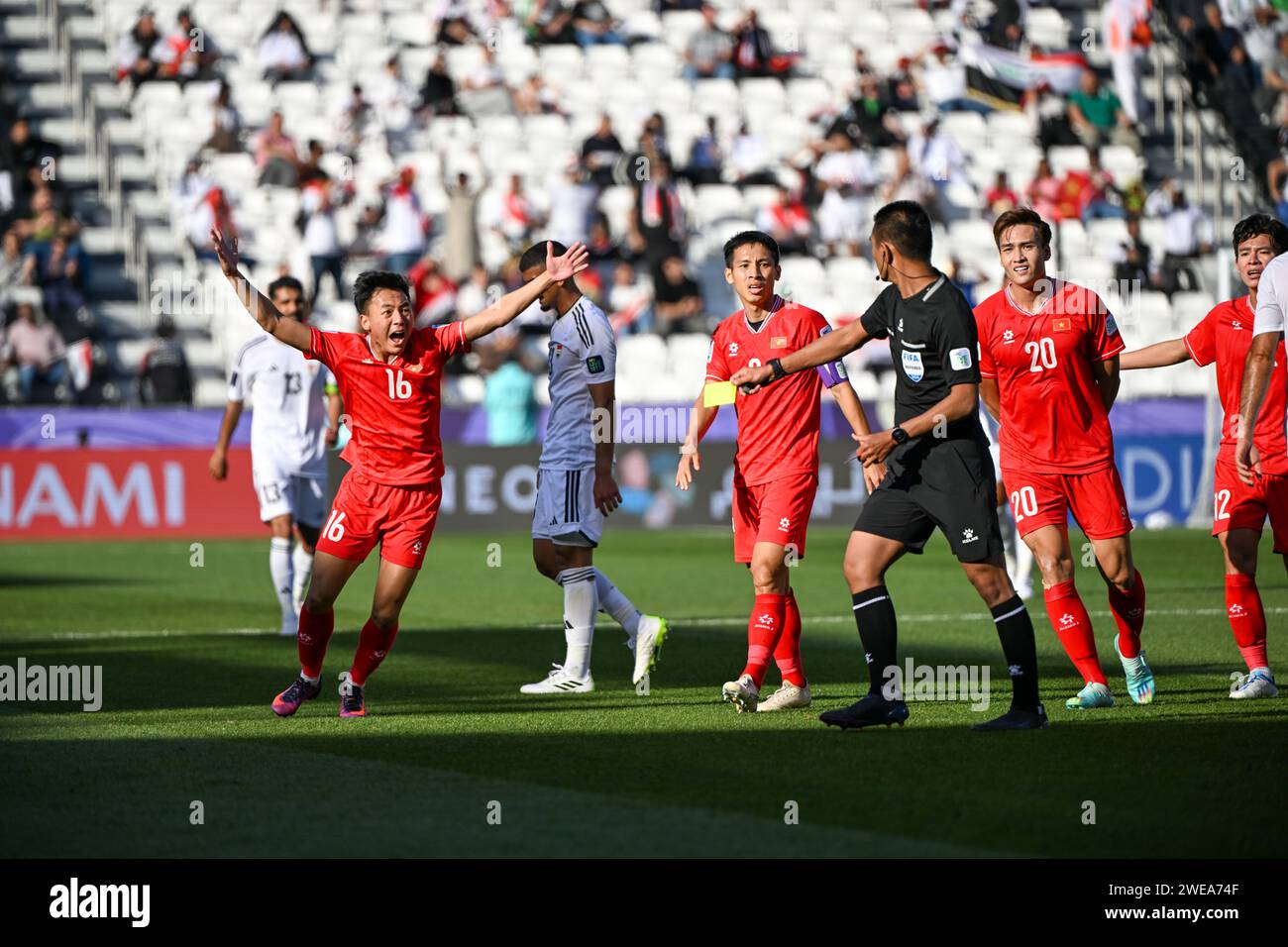 Doha. 24th Jan, 2024. Referee Muhammad Nazmi Nasaruddin (Front R) talks ...