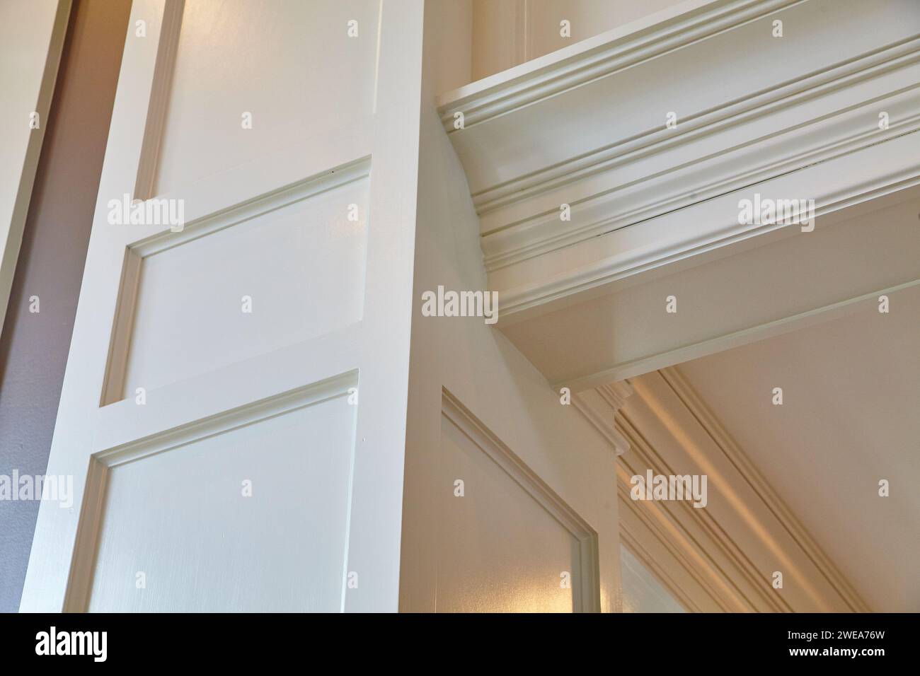 Elegant White Door and Ornate Crown Molding Interior Detail Stock Photo ...