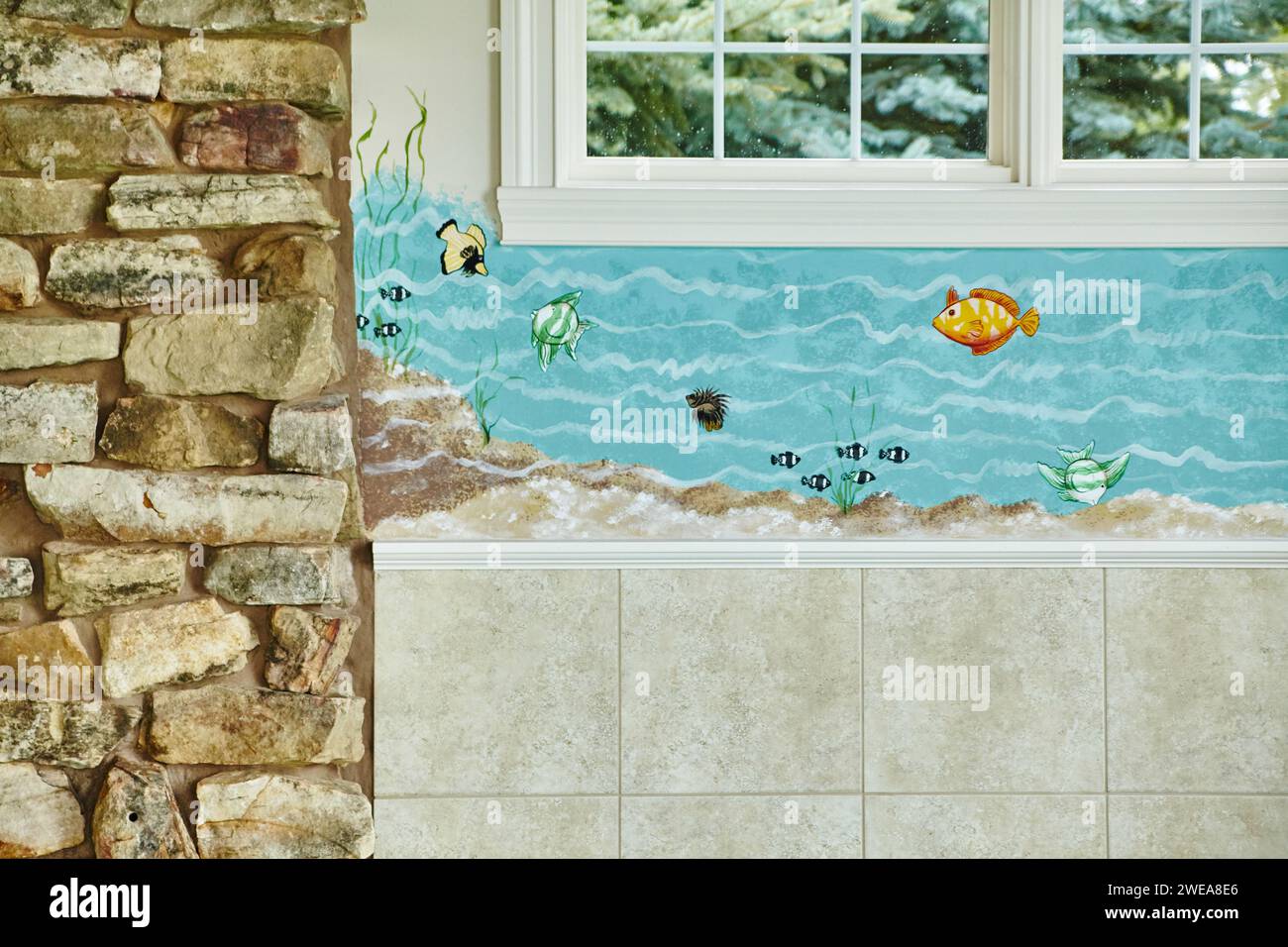 Whimsical Undersea Mural and Stone Veneer Wall in Home Interior Stock ...