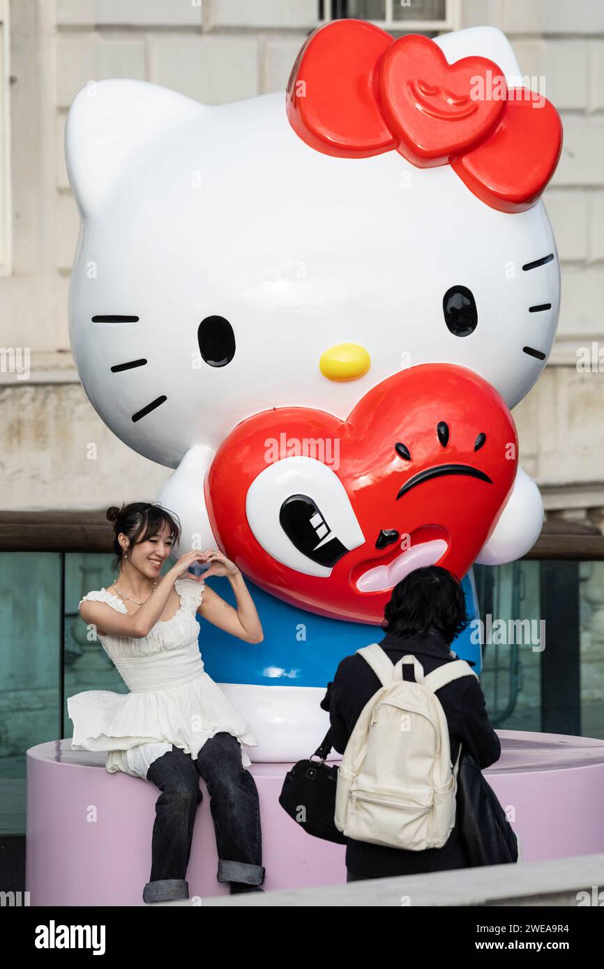 London, UK. 24 January 2024. Passers by interact with 'Hello, Love ...