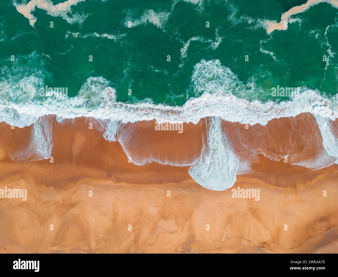 Nazaré Reverie: A Mesmerizing Aerial View of Atlantic Waves Embracing ...