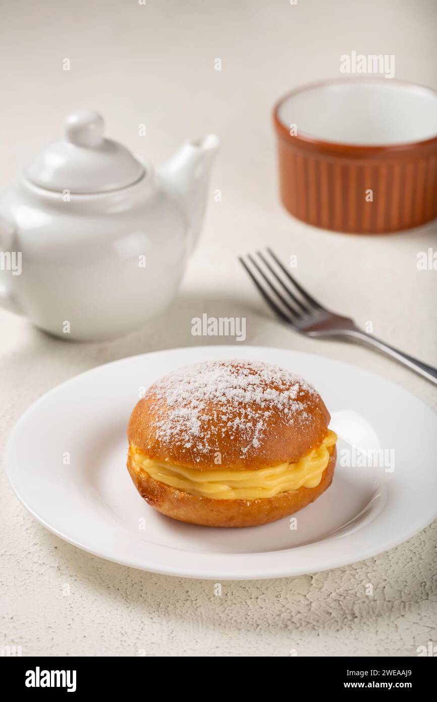 Berlin balls. Bread stuffed with icing cream Stock Photo - Alamy