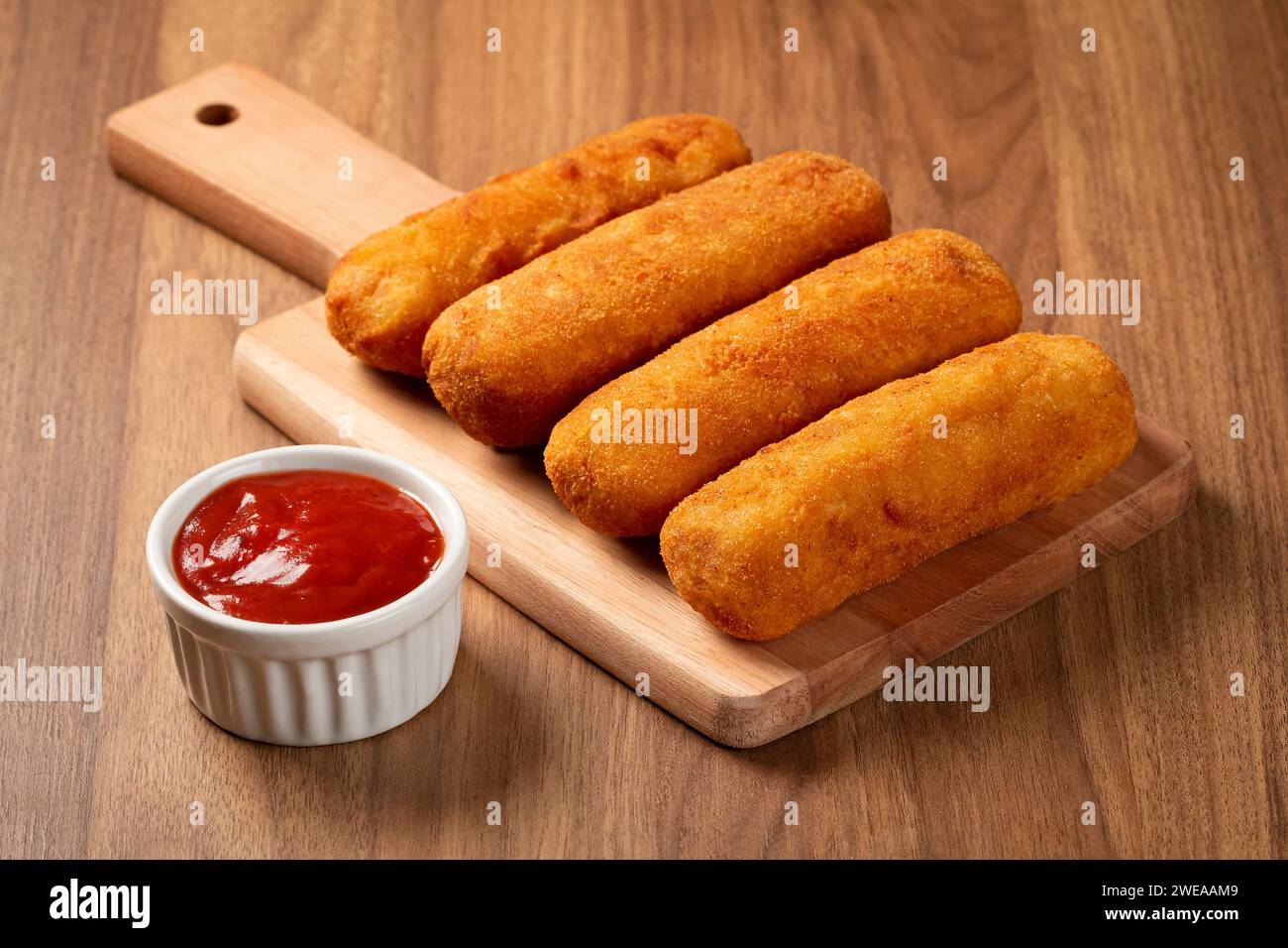 Fried risoles or Risol. Risoles stuffed with cheese and ham Stock Photo ...
