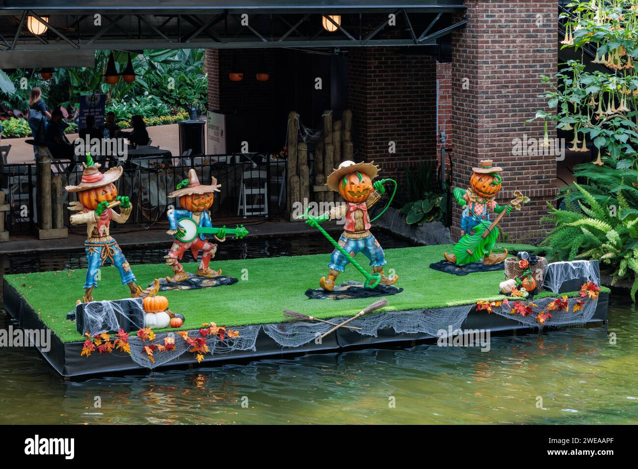 Platform decorated with Halloween characters alon the canal inside ...